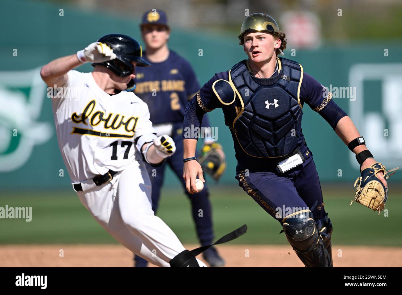 Iowa's Andy Nelson (17) gets caught in a rundown in front of Notre Dame ...