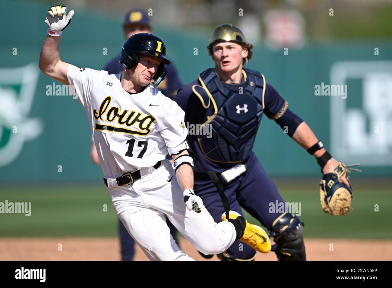 Iowa's Andy Nelson (17) gets caught in a rundown in front of Notre Dame ...