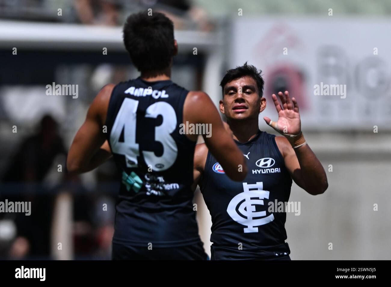 Melbourne, Australia. 22nd Feb, 2025. Jesse Motlop of Carlton (right ...