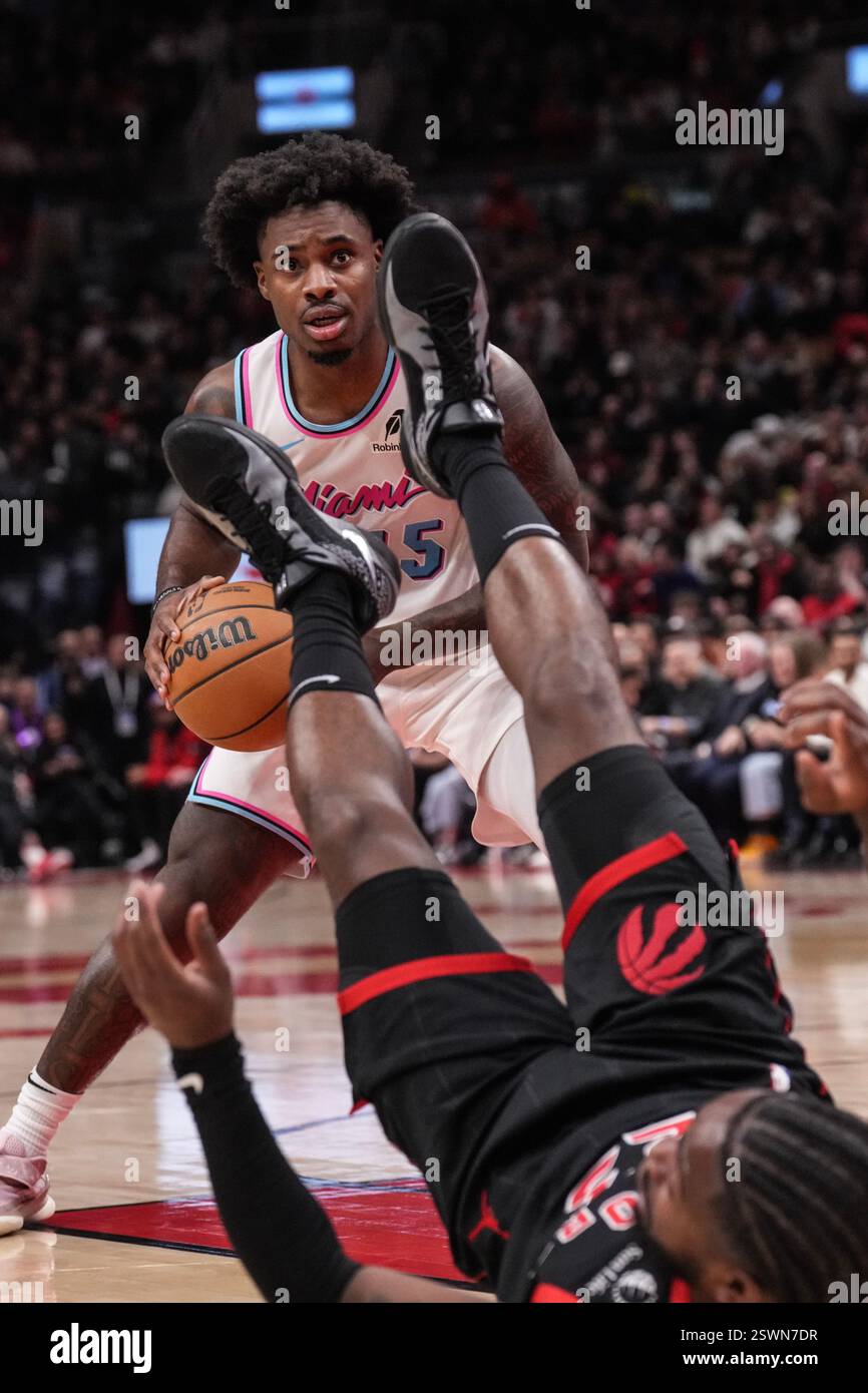 Toronto, Canada. 21st Feb, 2025. Miami Heat's Davion Mitchell (45 ...