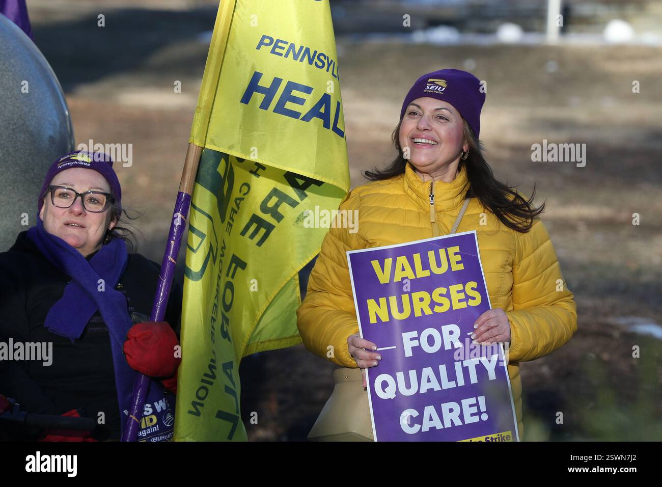 Striking Geisinger nurses hold placards as they rally near the ...