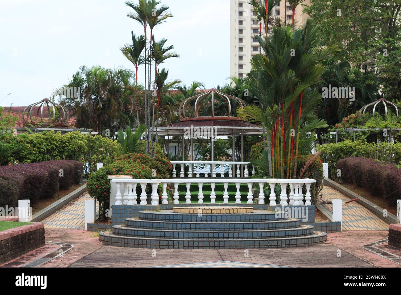 A view of the Malacca Sultanate Palace Gardens, surrounded by vibrant ...