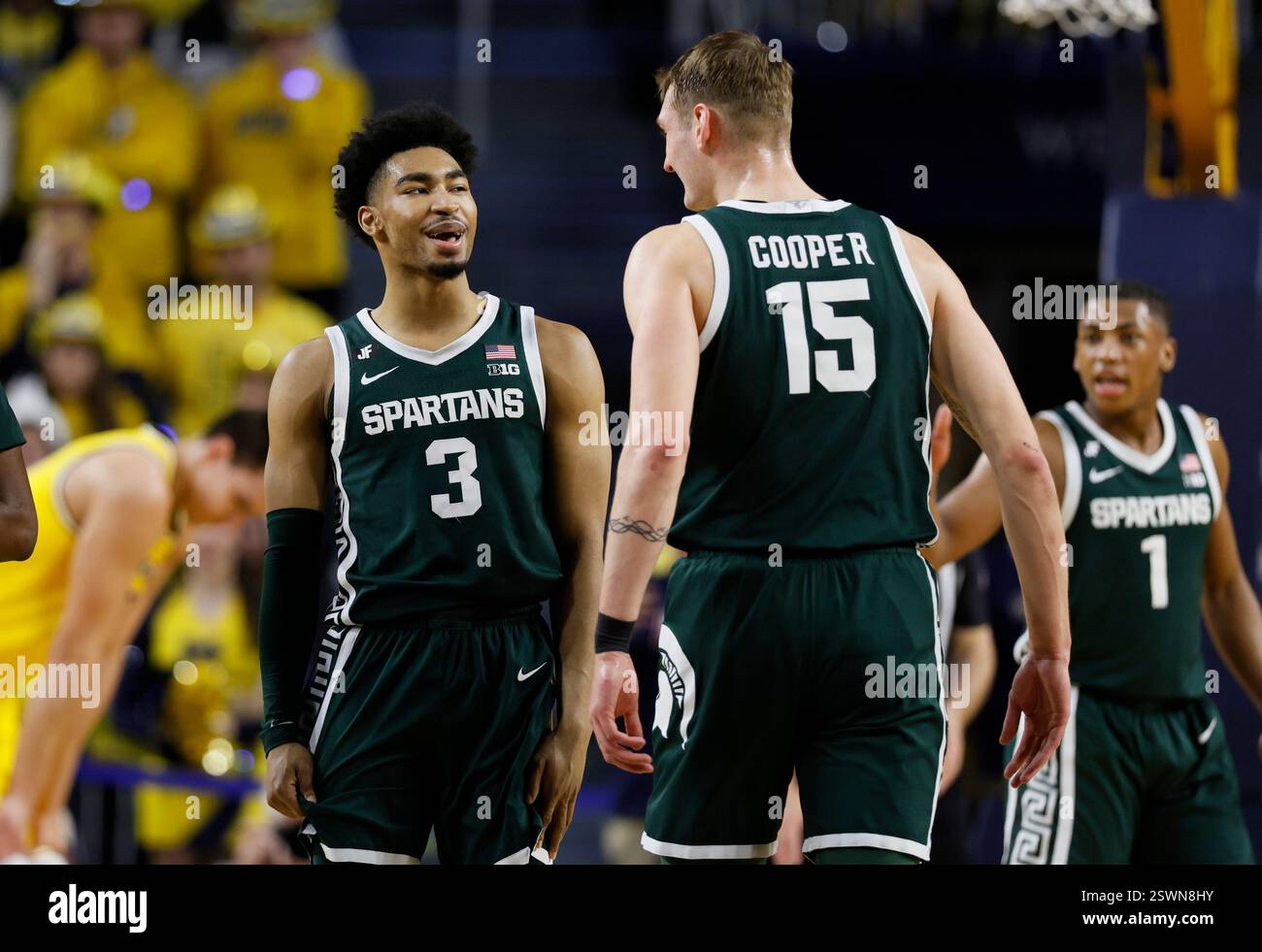 Michigan State guard Jaden Akins (3) celebrates with center Carson ...