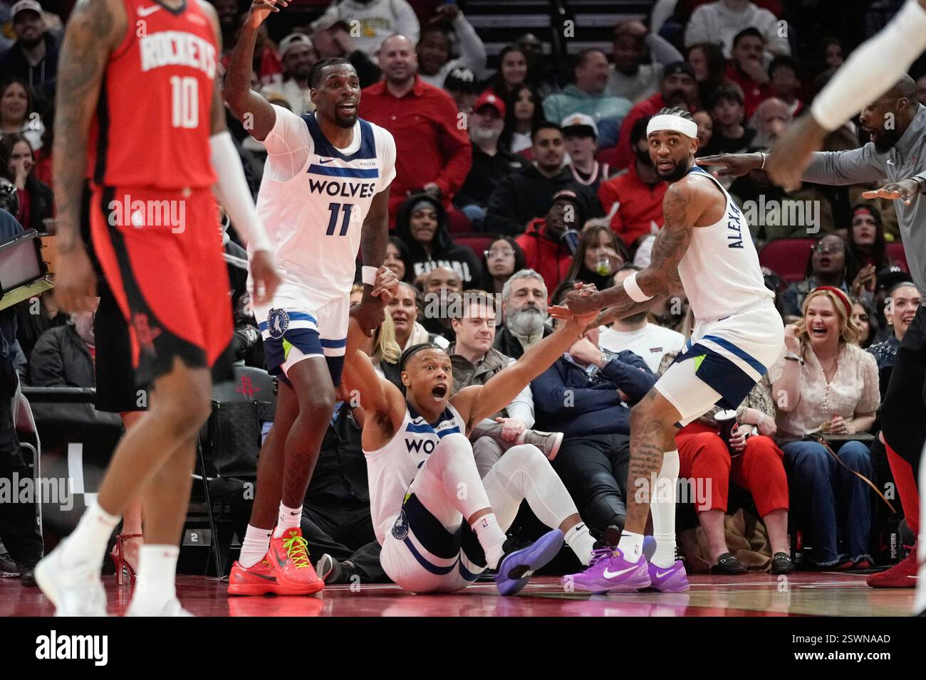 Minnesota Timberwolves guard Jaylen Clark, bottom center, reacts after ...