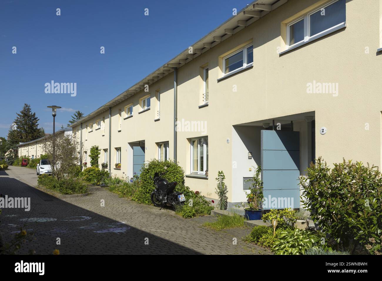 Modern terraced houses Am Schulfeld, which take up the small-scale ...