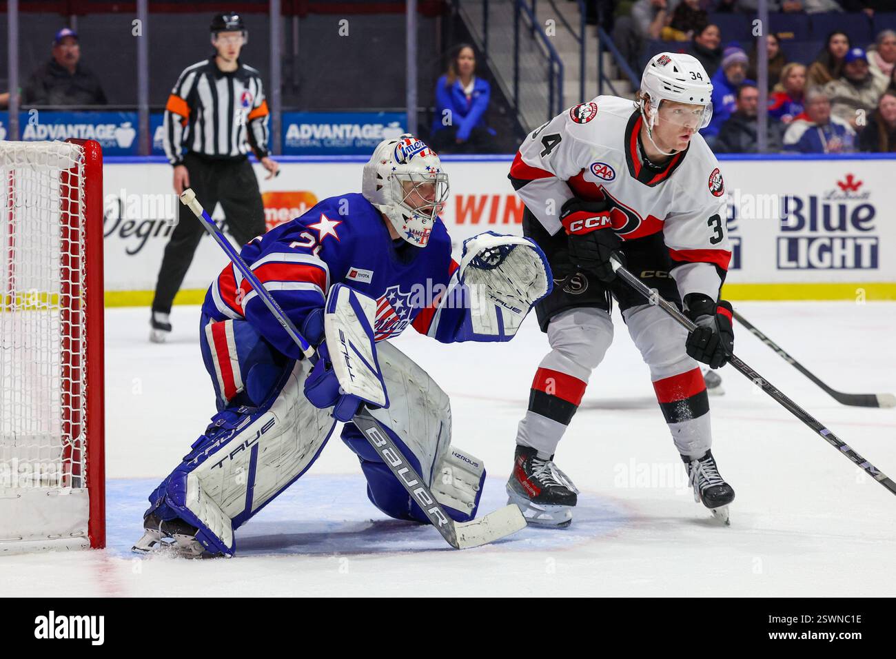 Rochester, New York, USA. 21st Feb, 2025. Rochester Americans goaltender Michael Houser (29) and ...