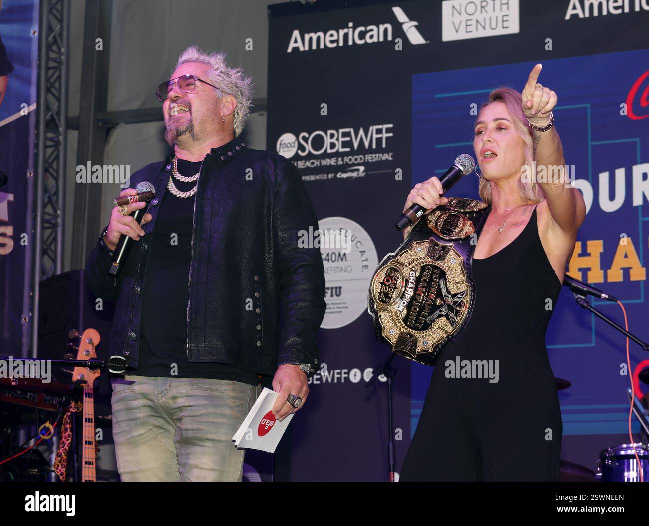 MIAMI BEACH, FL - FEBRUARY 21: Guy Fieri and Brooke Williamson attend ...
