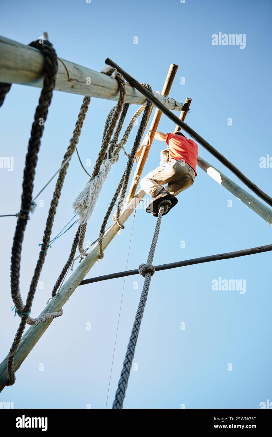 Outdoor obstacles, rope or man climbing for strength, endurance ...