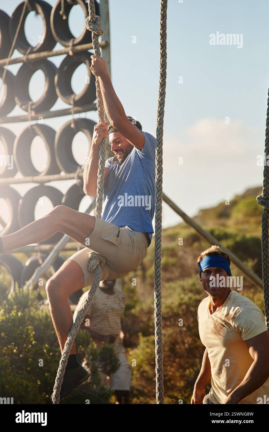 People, rope or climbing in bootcamp for workout, exercise or army ...