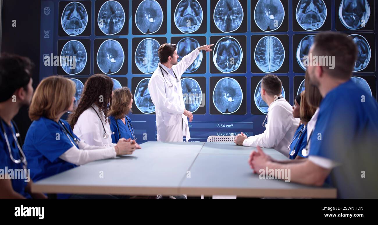 Medical Team Analyzing MRI Scan For Neurology Diagnosis In Clinic Stock ...