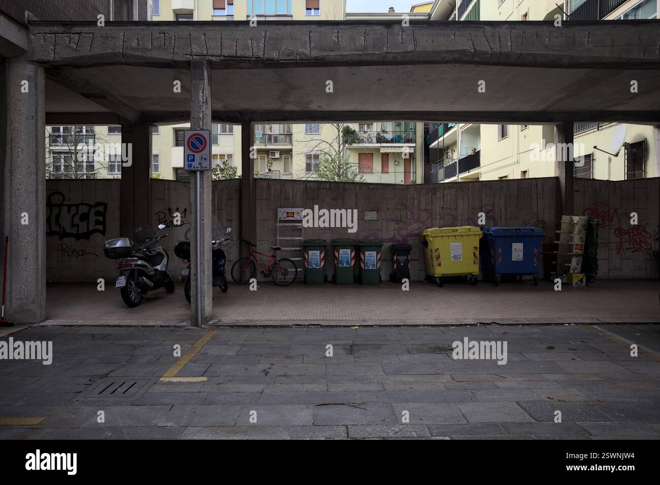 Mantova, Italy - 17TH FEBRUARY 2025 - Trash bins and garbage under a ...