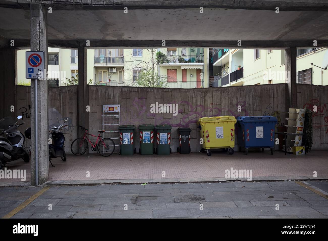 Mantova, Italy - 17TH FEBRUARY 2025 - Trash bins and garbage under a ...