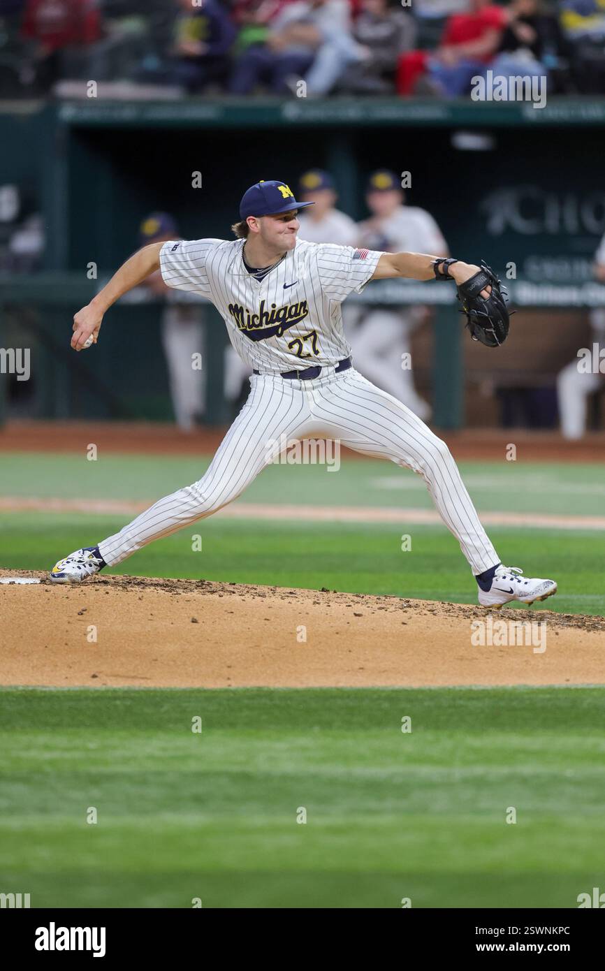 February 21, 2025: Wolverine pitcher Dylan Vigue (27) prepares to ...
