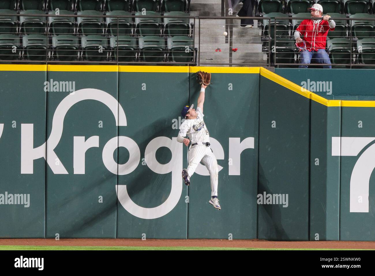 February 21, 2025: Michigan outfielder Colby Turner (14) goes up ...