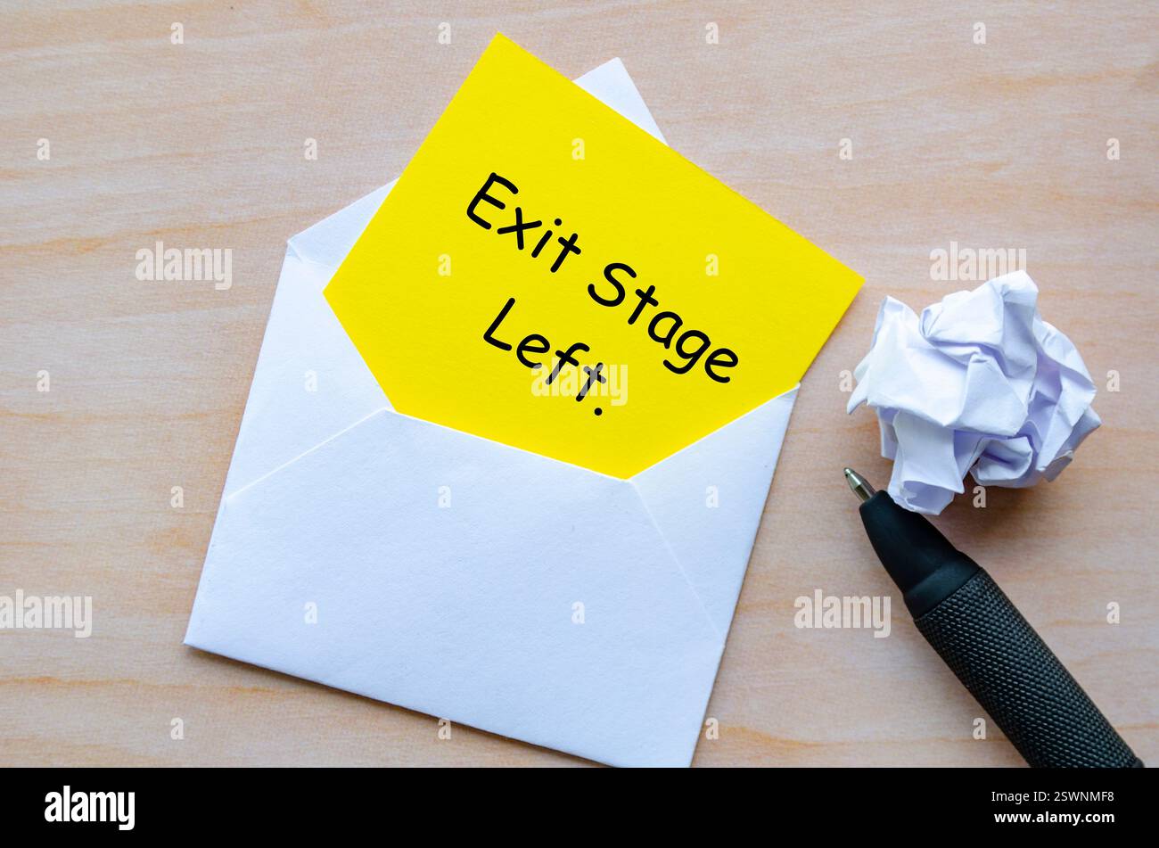 Exit Stage Left text on yellow paper in an envelope. Resignation ...