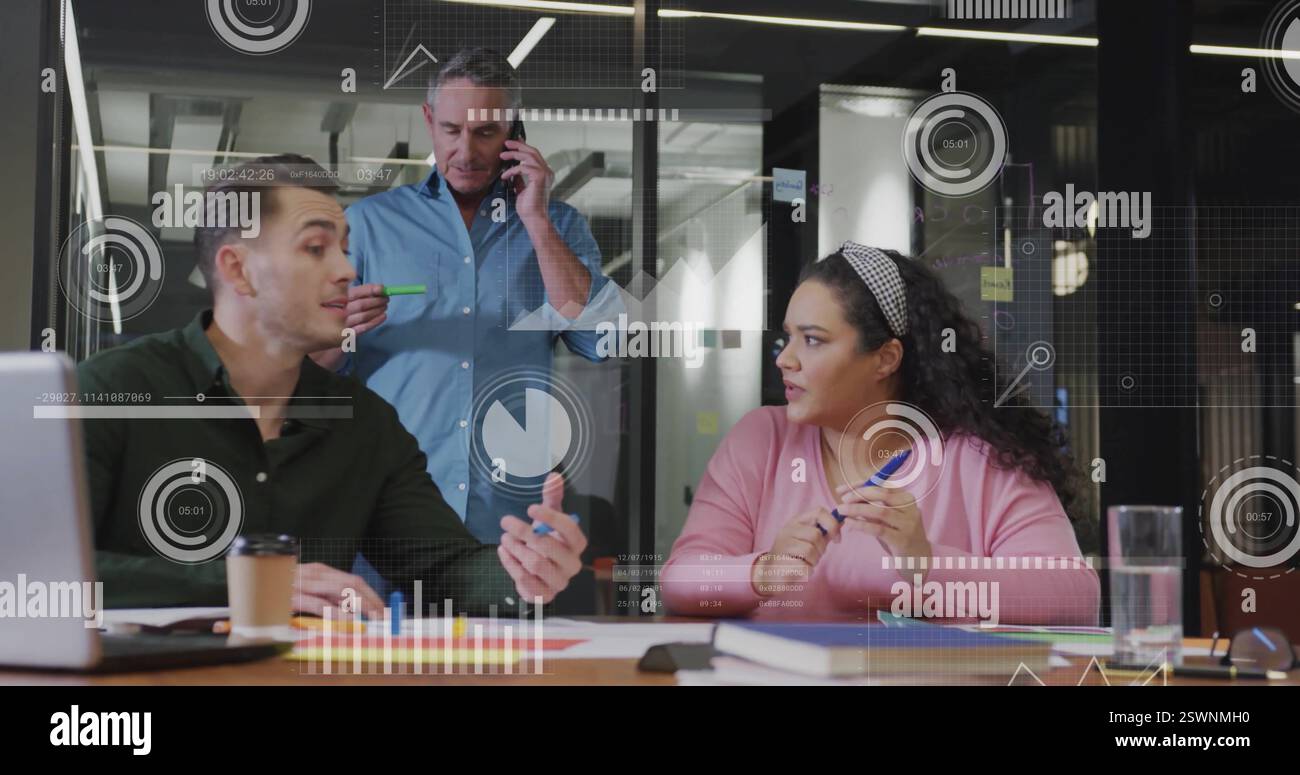 Image of data processing and diagrams over diverse colleagues ...