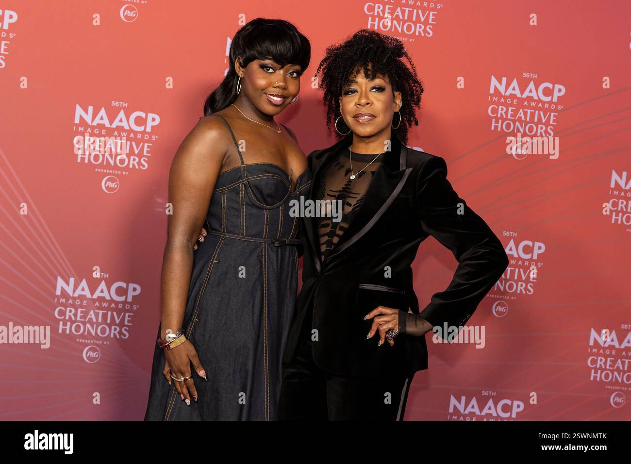 Los Angeles, USA. 21st Feb, 2025. Alijah Kai Haggins and Tichina Arnold ...