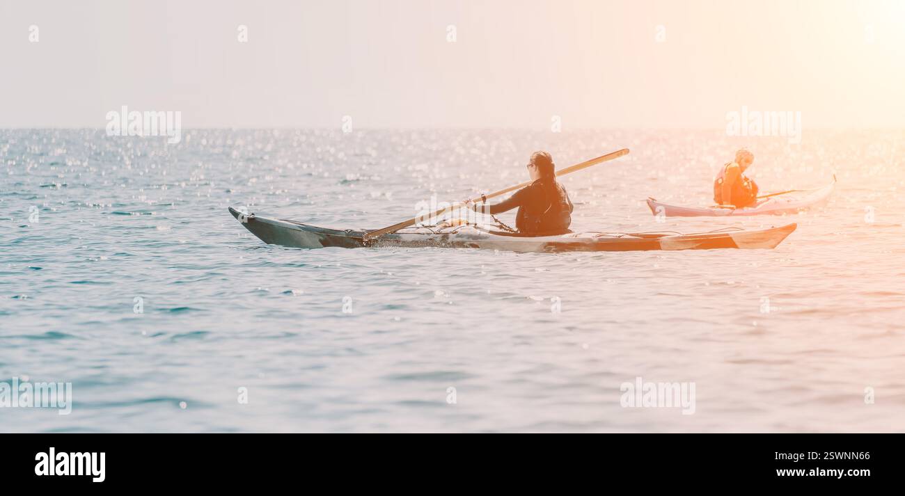 Kayaking, Two People, Ocean, Sunset, Paddling Stock Photo - Alamy