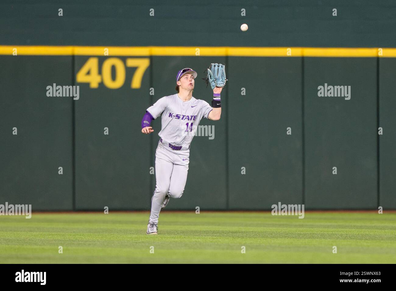 February 21, 2025: Micah Dean (14) Kansas State outfielder comes in ...