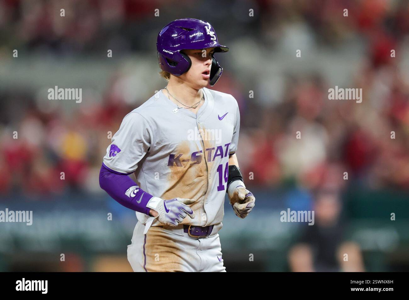 February 21, 2025: Micah Dean (14) of Kansas State makes his way back ...