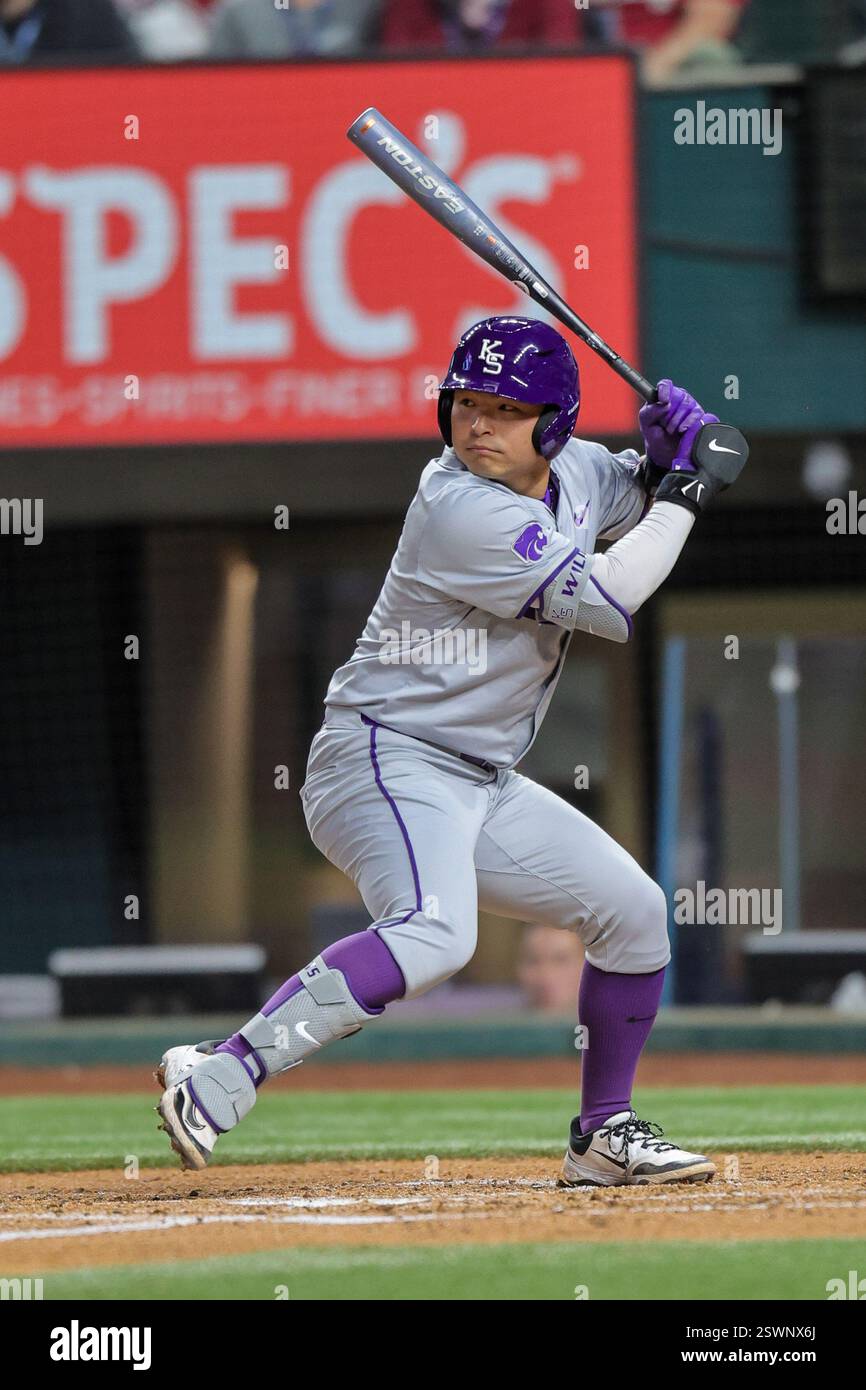 February 21, 2025: Shintaro Inoue (5) of Kansas State raises his right ...