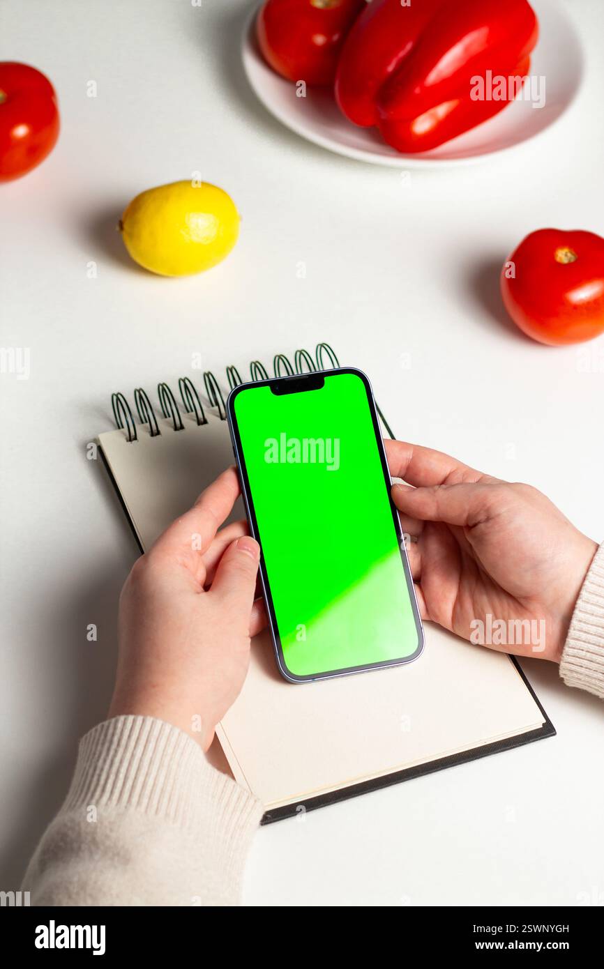 Planning Healthy Menu Concept Smartphone With Green Screen In Hands Calculating Calories