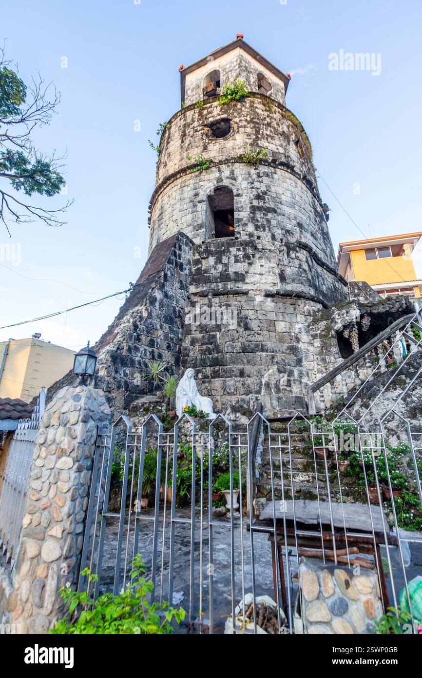 The historic belfry of Dumaguete Cathedral stands tall as a Spanish-era ...