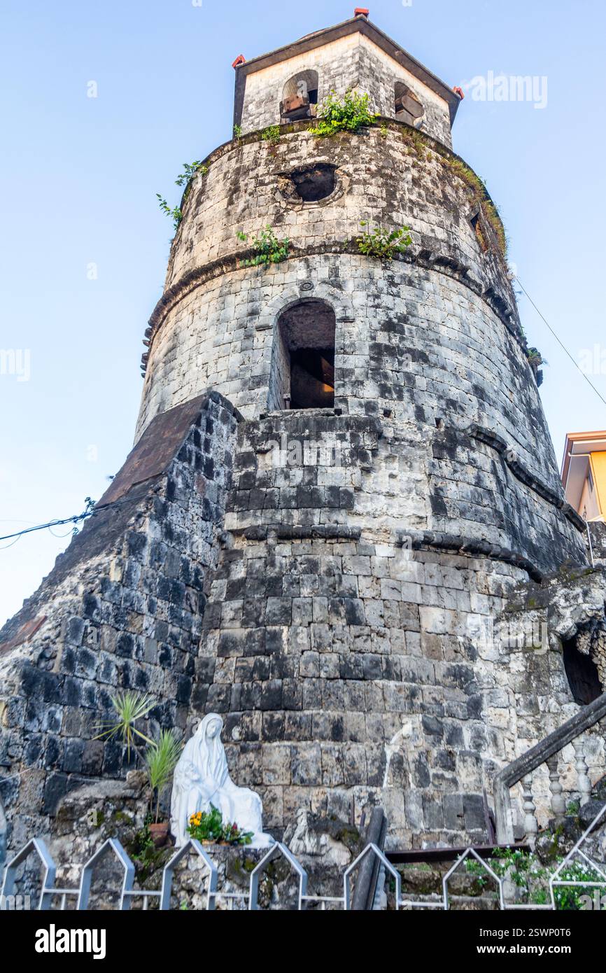 The historic belfry of Dumaguete Cathedral stands tall as a Spanish-era ...