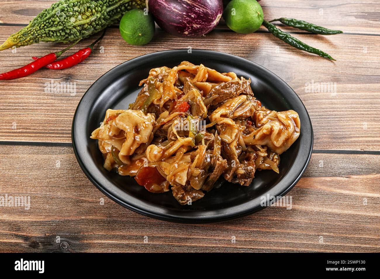 Tibetian cuisine - thenthuk noodles with beef and spices Stock Photo ...