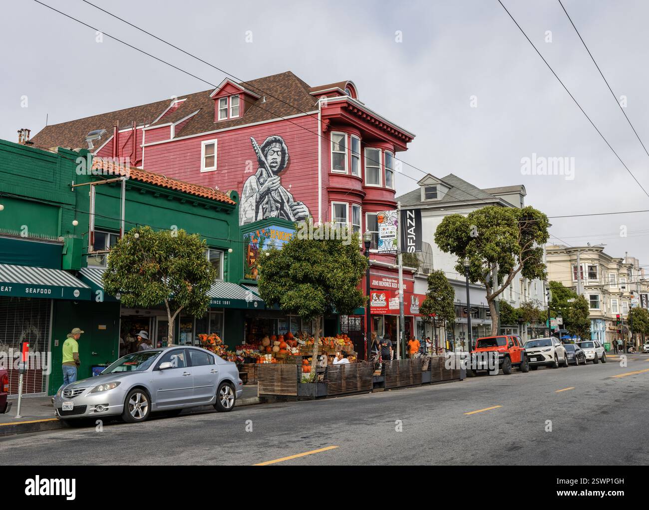 Jimi Hendrix House (red) and retro shops, cafes, legal cannabis stores ...