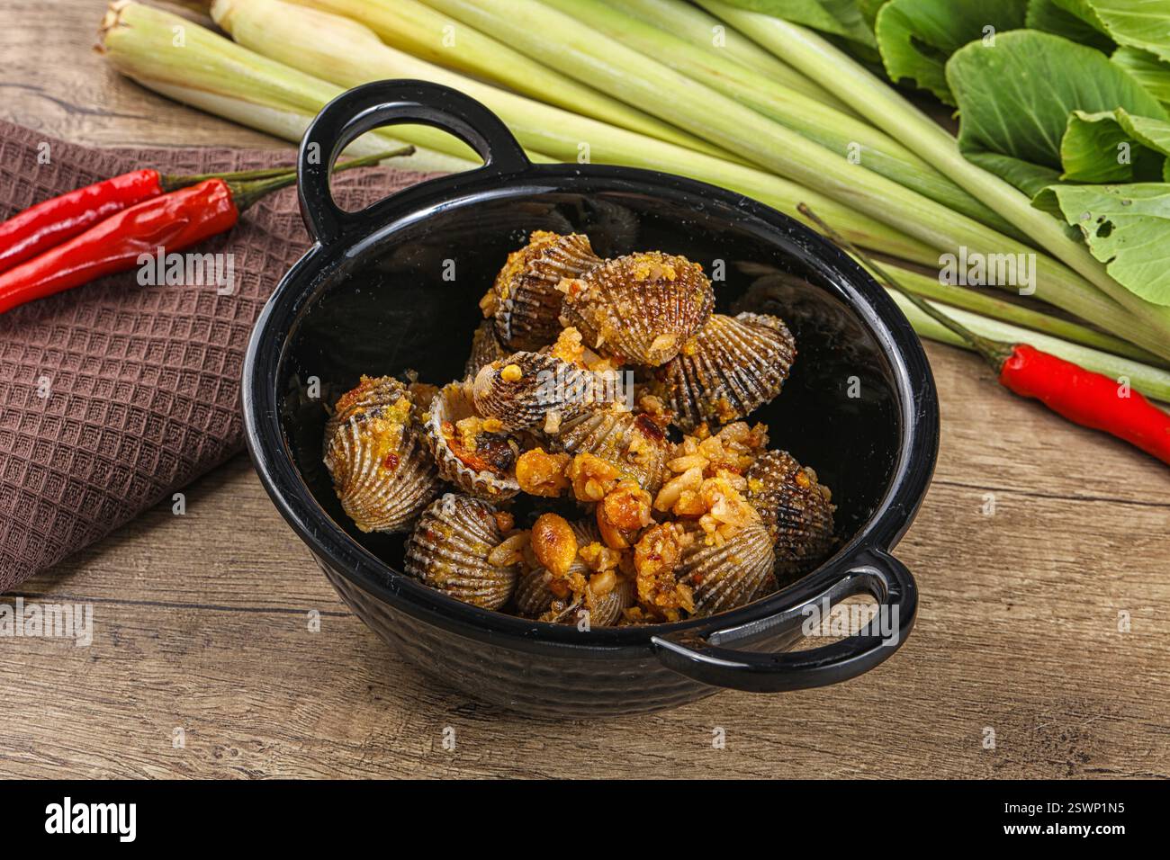 Blood Cockle Fried With Garlic and spices Stock Photo - Alamy