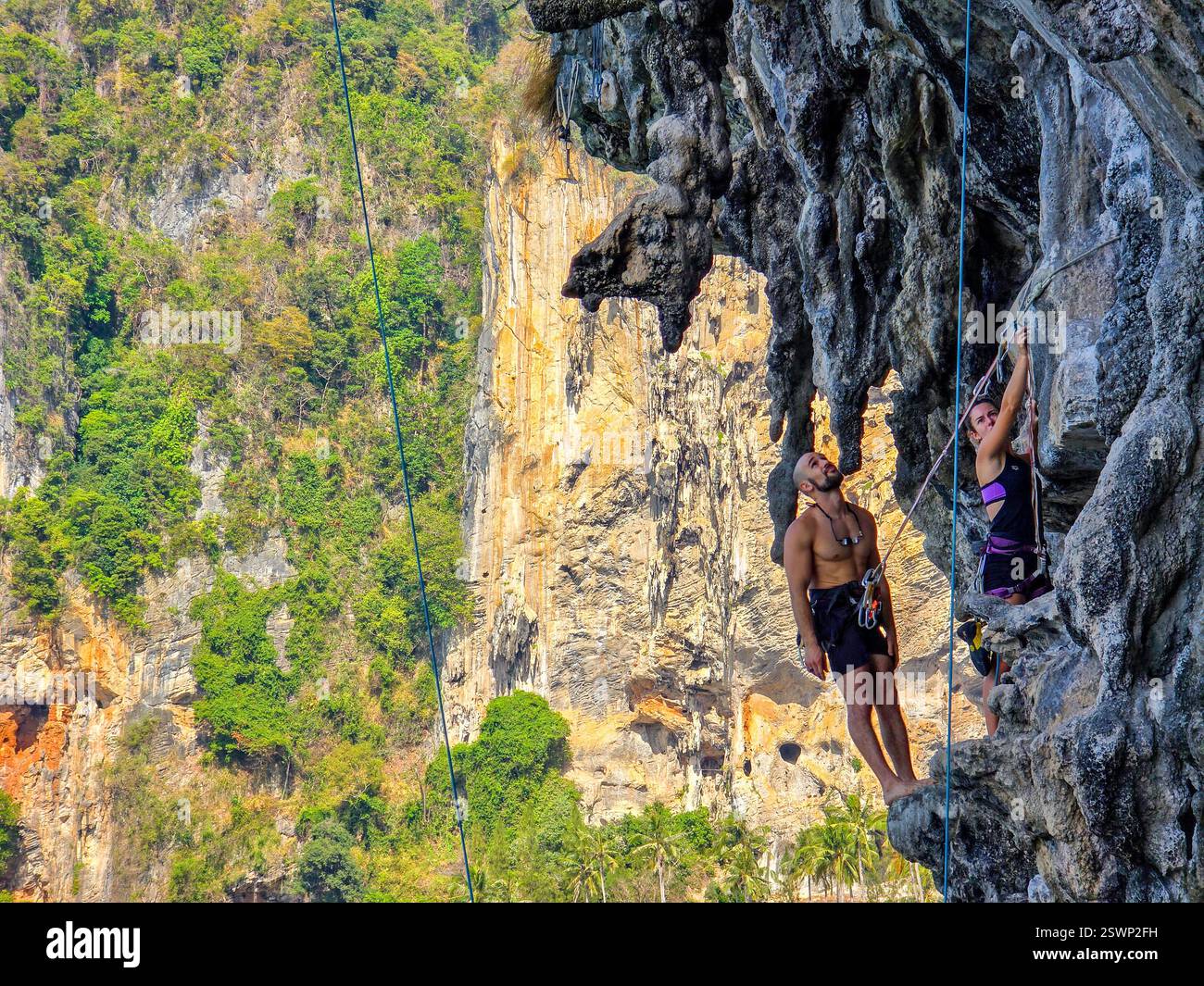 Krabi Thailand 31 January 2025, Railay Beach, two climbers tackle a ...