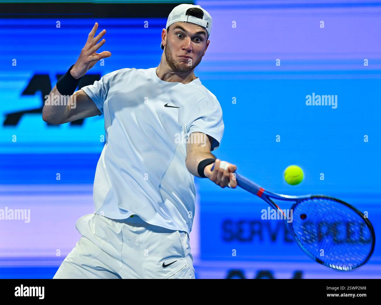 Doha, Qatar. 21st Feb, 2025. Jack Draper of Britain hits a return ...