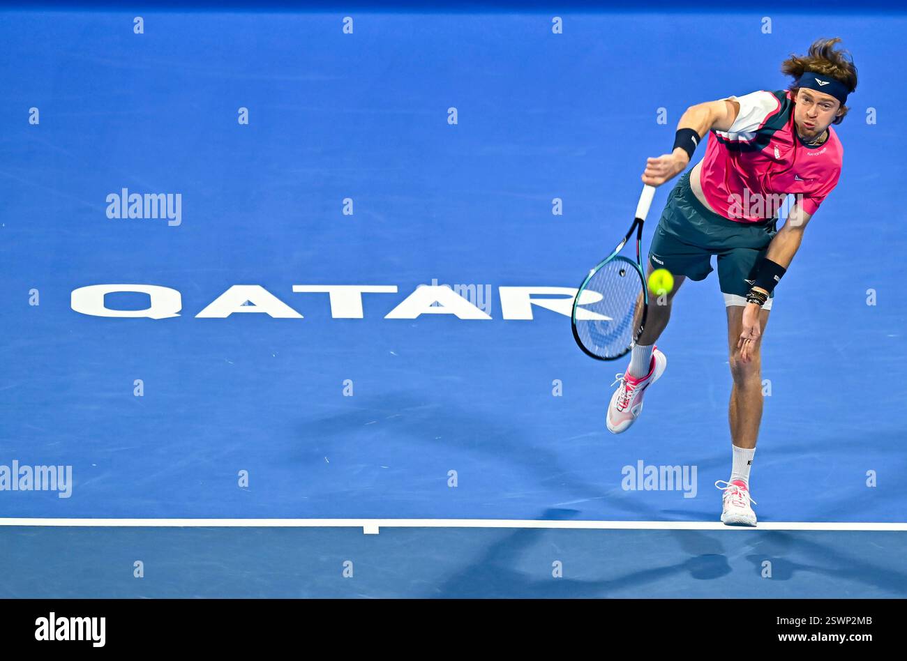 Doha, Qatar. 21st Feb, 2025. Andrey Rublev of Russia serves during the men's singles semifinal ...