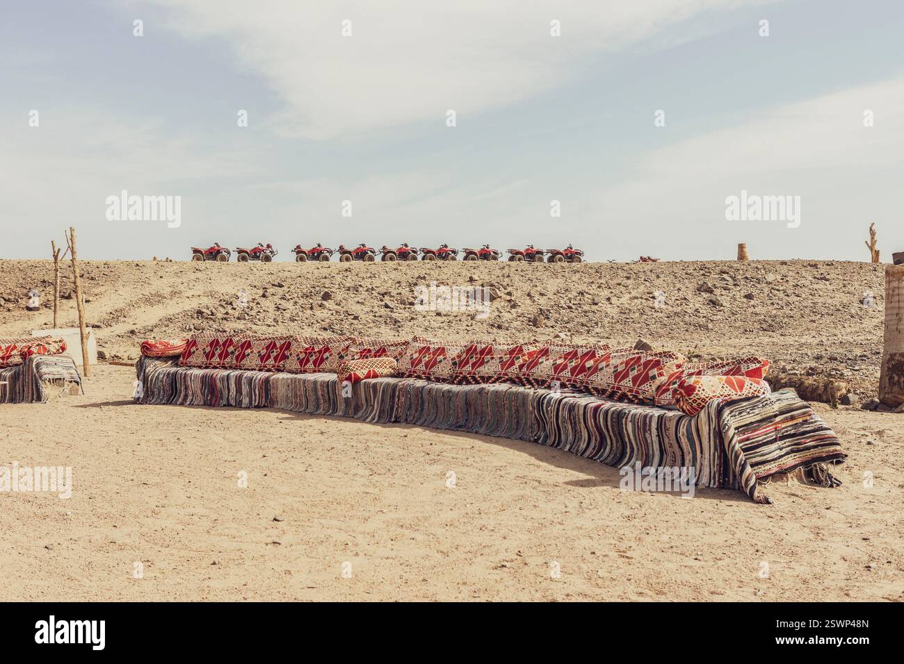 Traditional bedouin campsite featuring comfortable seating and stunning ...