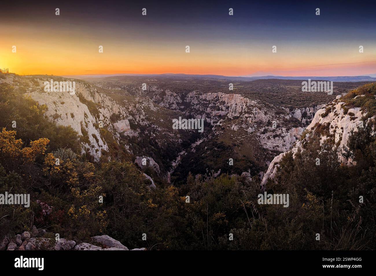 Sunset landscape in Sicily, Italy. Rock stone in Fiume Cassibile river ...