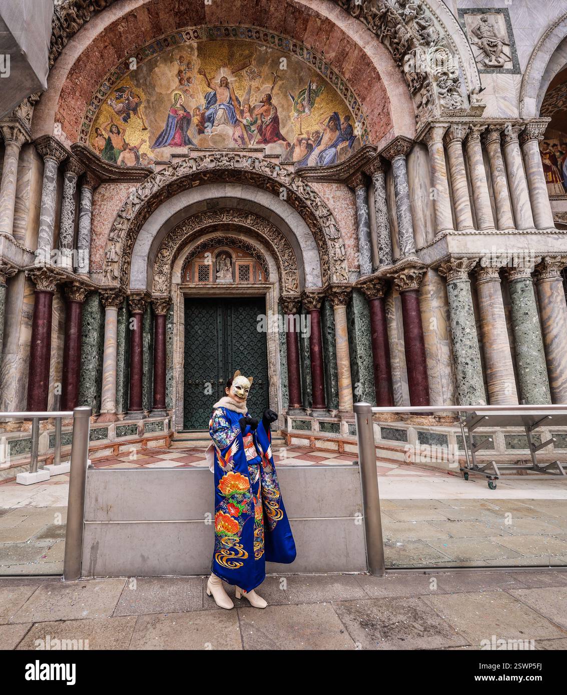 venice, Italy. 22nd Feb, 2025. Revellers by San Marks in colourful ...