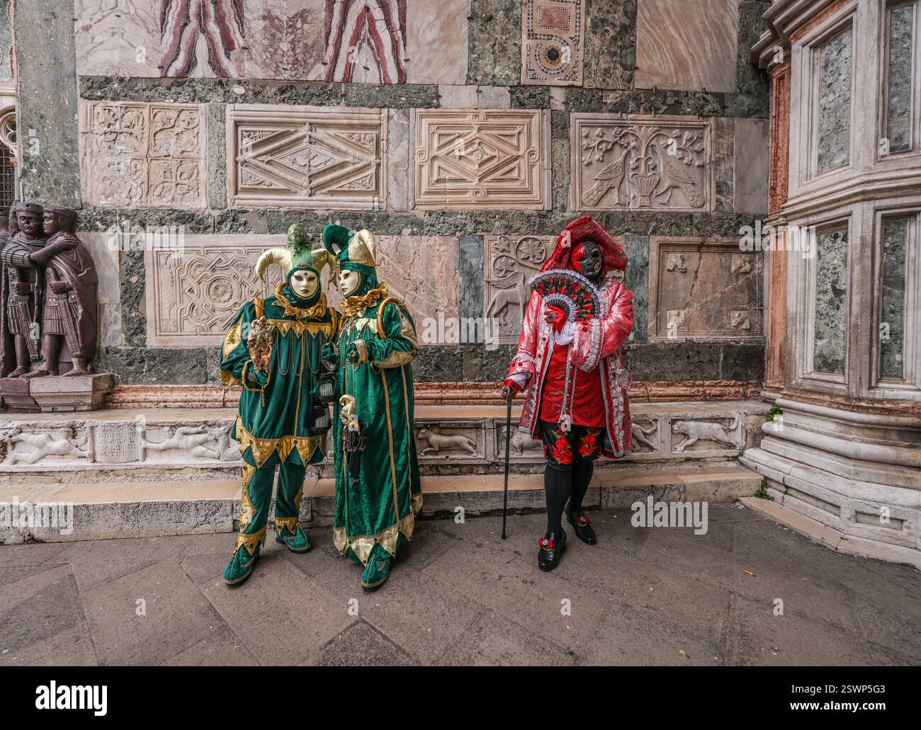venice, Italy. 22nd Feb, 2025. Revellers by San Marks in colourful ...