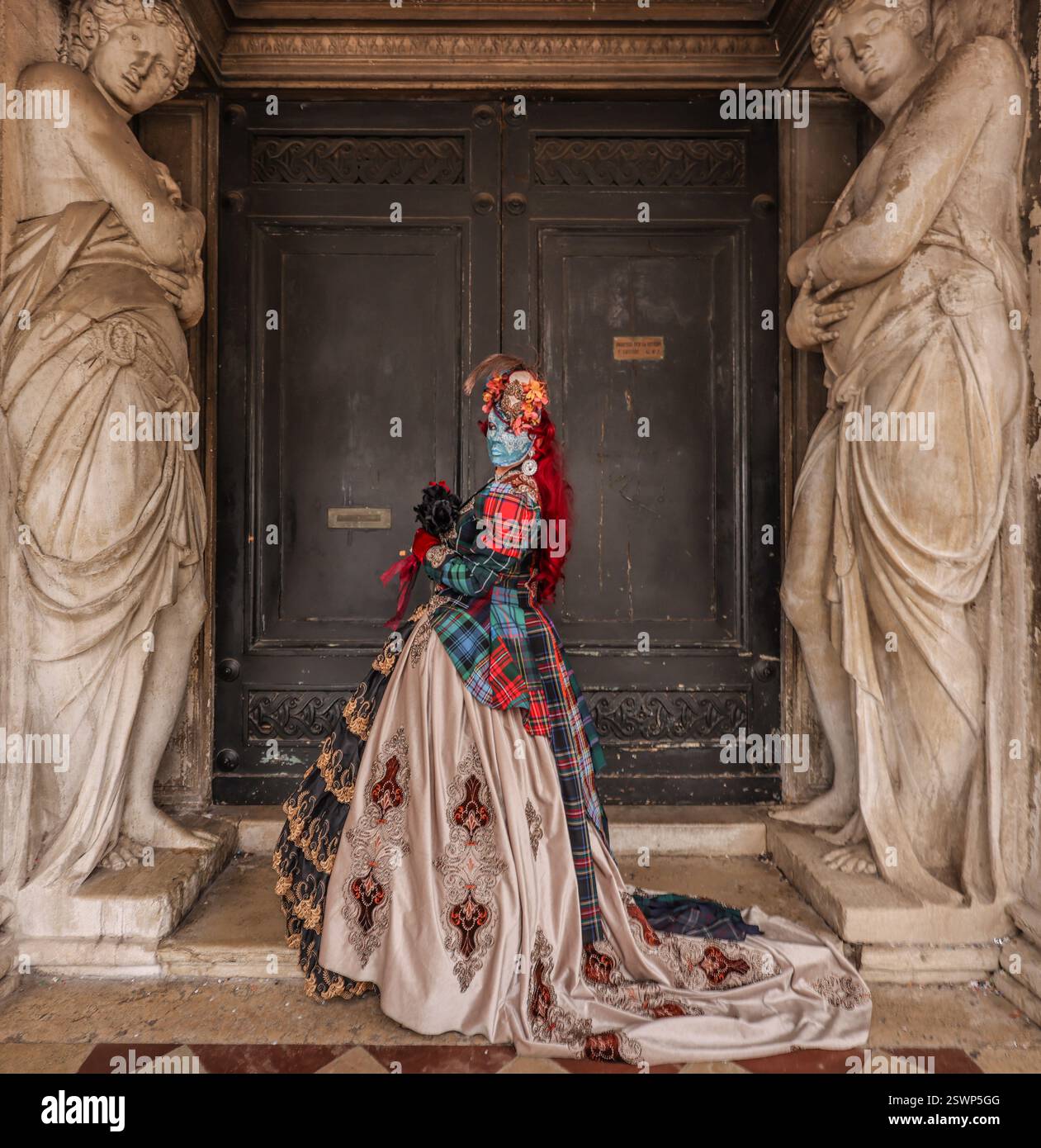 venice, Italy. 22nd Feb, 2025. Revellers by San Marks in colourful ...