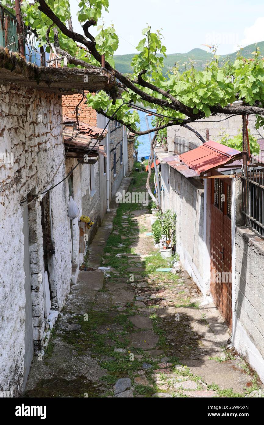 Romantic alley in the small fishing village of Lin, Albania Stock Photo ...