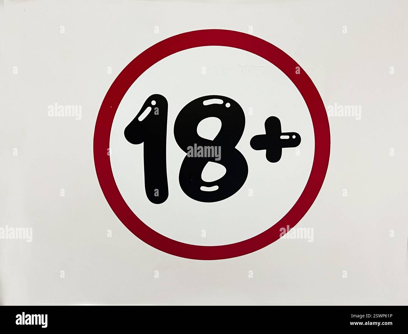 Eighteen plus 18 + symbol displayed inside a red circle on a white ...