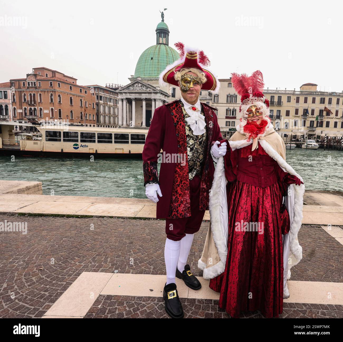 venice, Italy. 22nd Feb, 2025. Revellers by San Marks in colourful ...