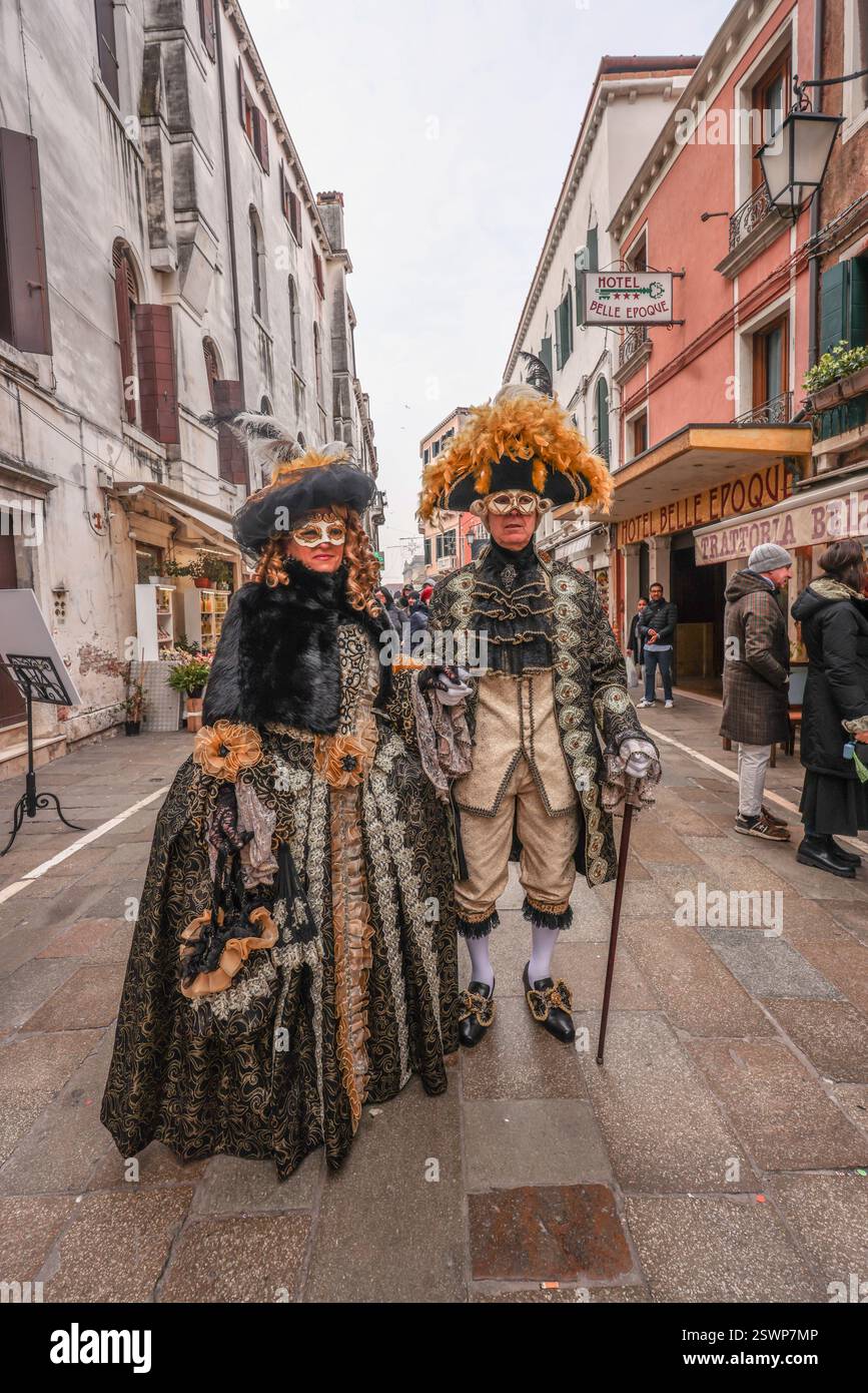venice, Italy. 22nd Feb, 2025. Revellers by San Marks in colourful ...