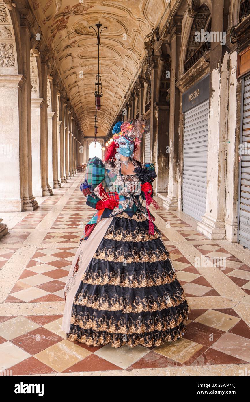 venice, Italy. 22nd Feb, 2025. Revellers by San Marks in colourful ...