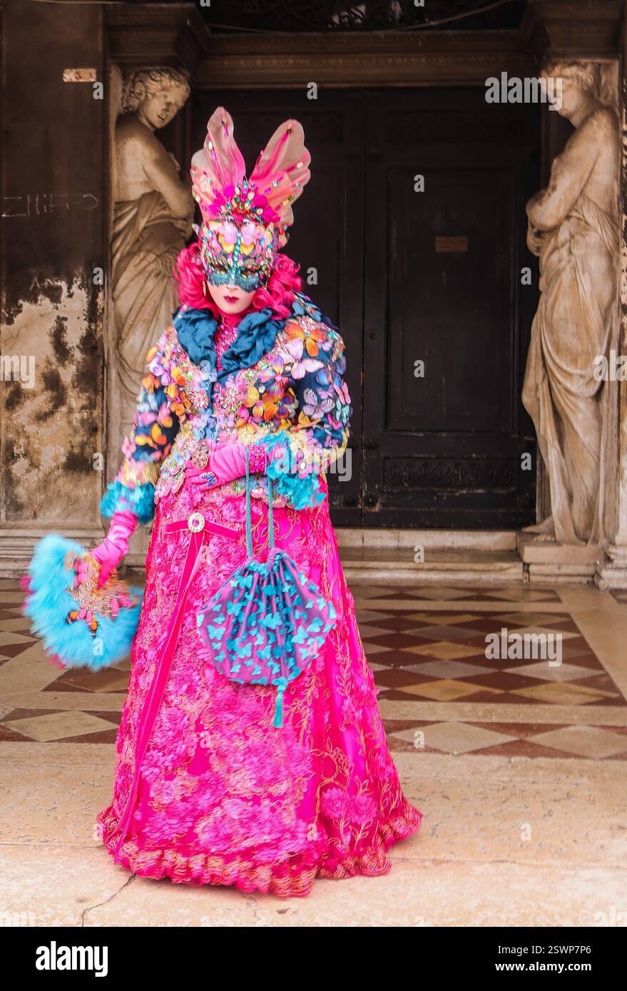venice, Italy. 22nd Feb, 2025. Revellers by San Marks in colourful ...
