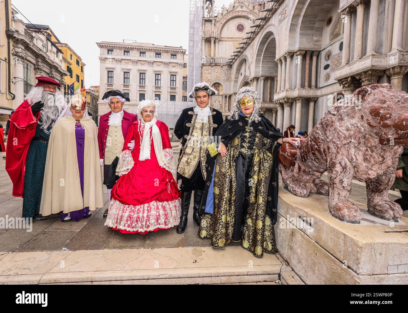 venice, Italy. 22nd Feb, 2025. Revellers by San Marks in colourful ...