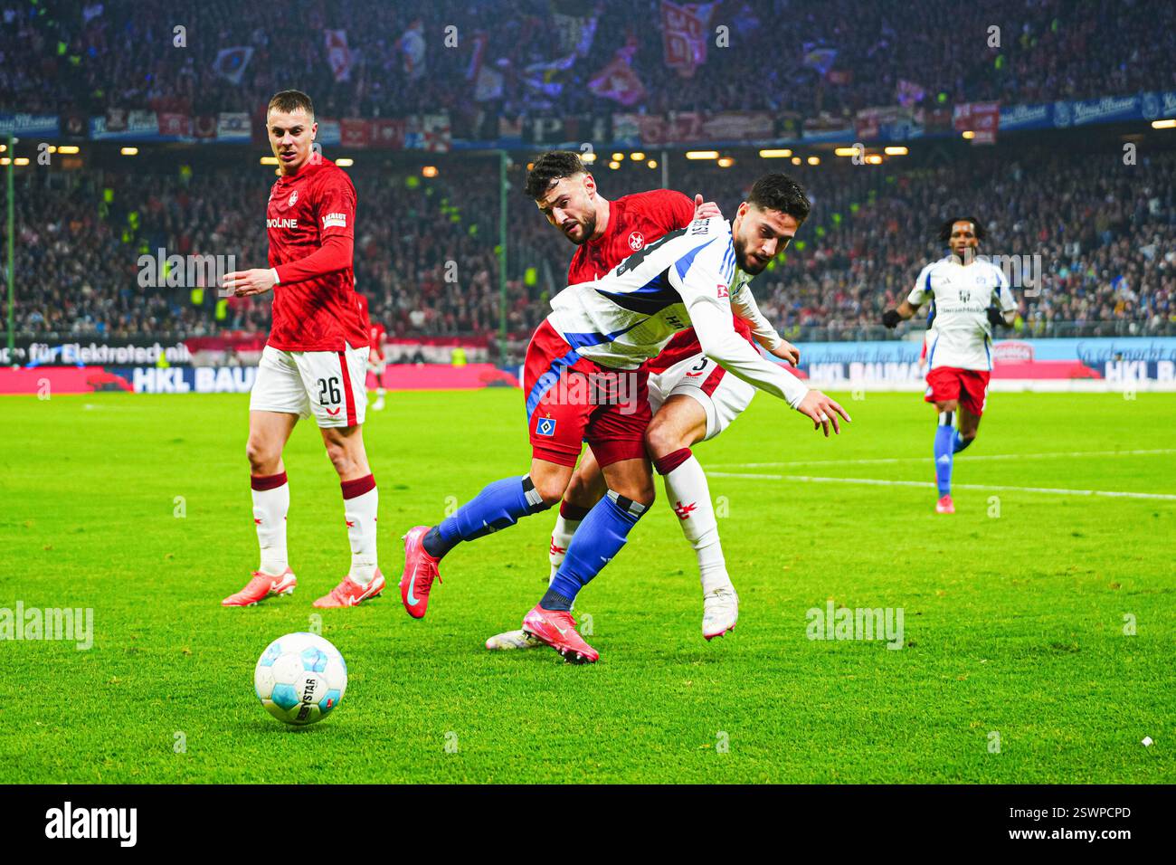 Hamburg, Deutschland. 21st Feb, 2025. Filip Kaloc (1. FC Kaiserslautern, #26), Ludovit Reis ...