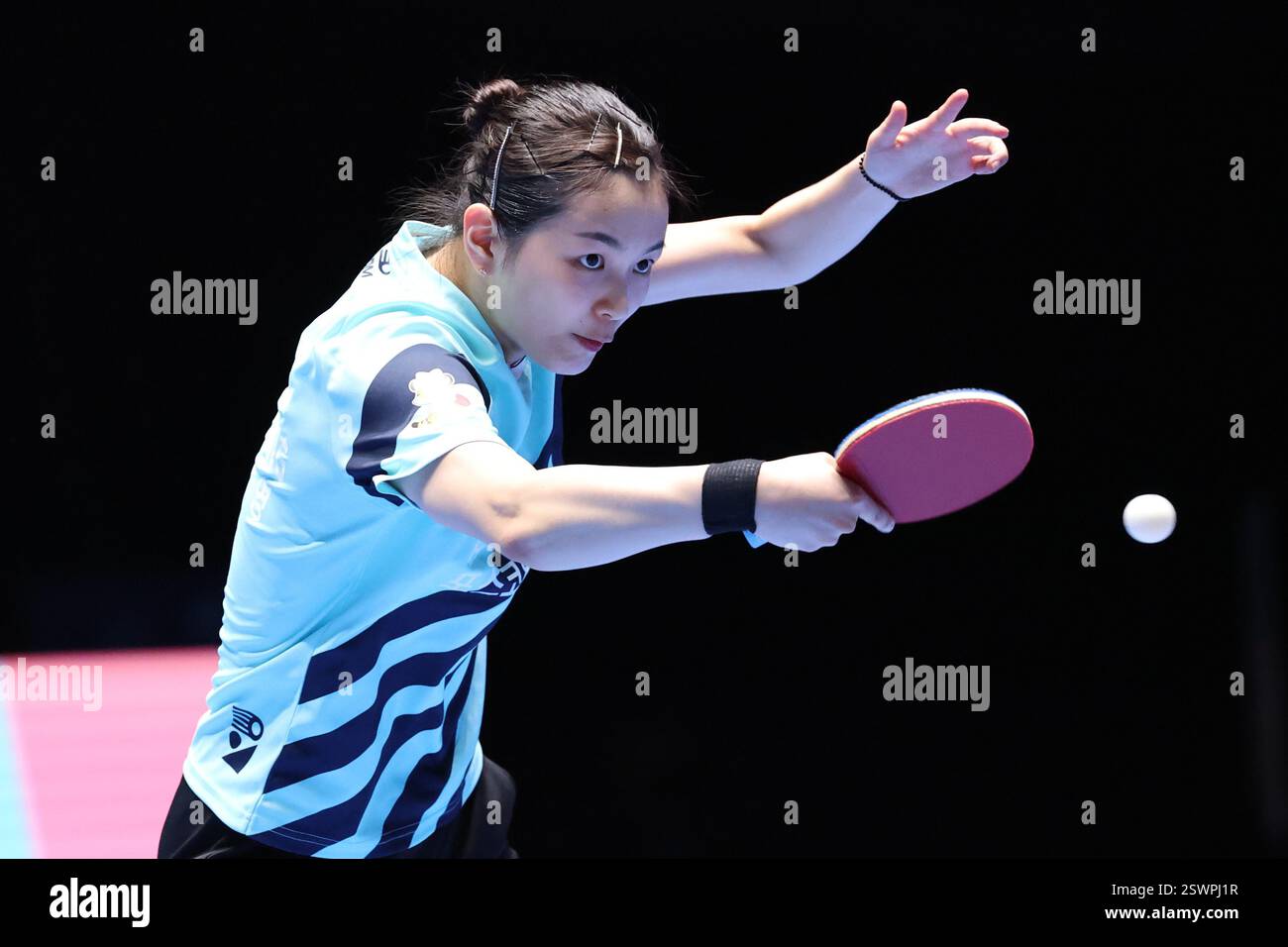 (250222) -- SHENZHEN, Feb. 22, 2025 (Xinhua) -- Kim Nayeong of South Korea hits a return during ...