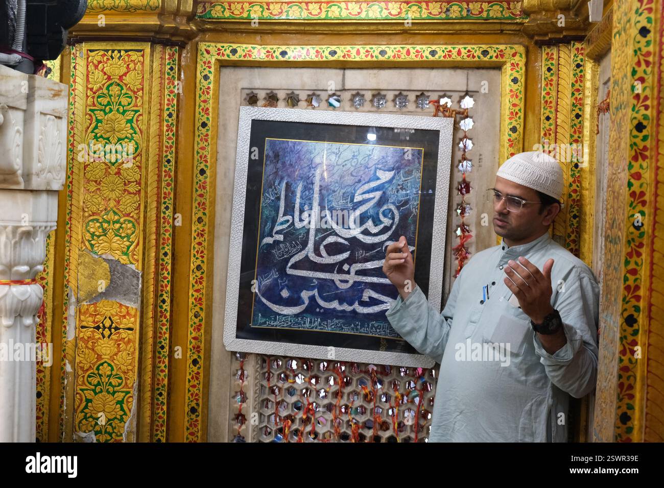 Pilgrim prays in the tomb of Nizamuddin Auliya, a 13th Century Sufi ...