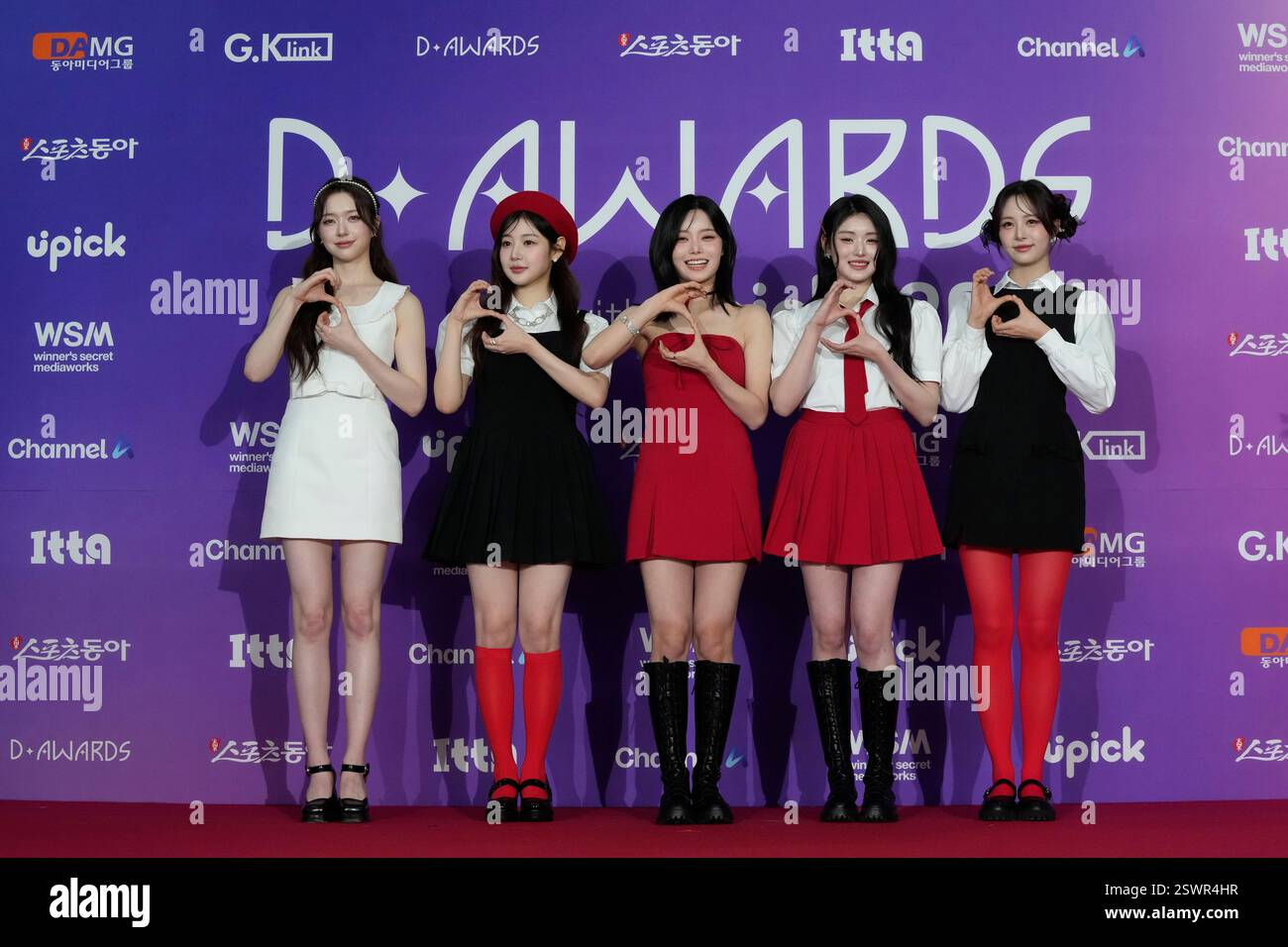 Members of South Korean K-Pop group FIFTY FIFTY pose for photos during ...